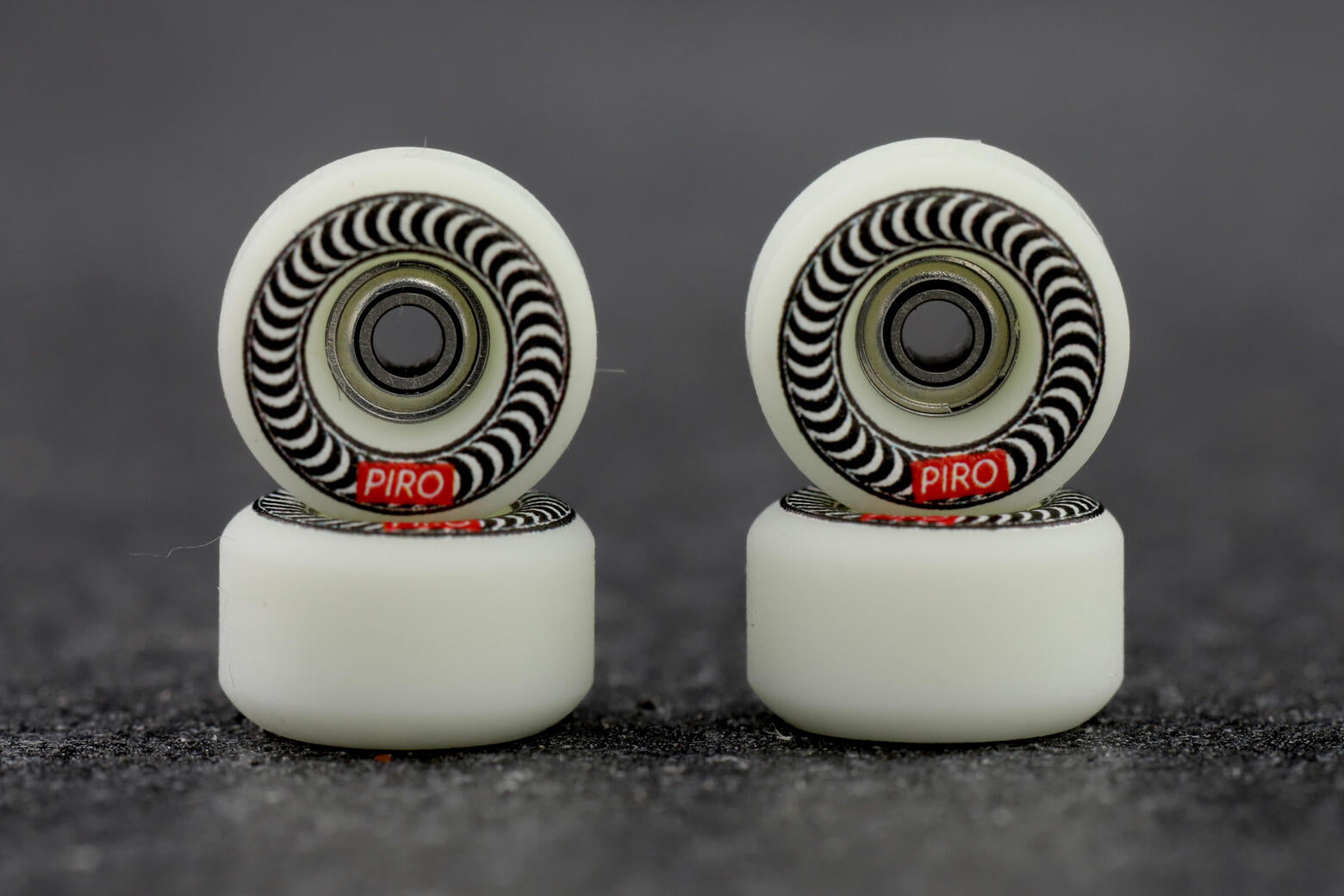 Piro Spiral White Real Wear Graphic Performance Wheels | Skull Fingerboards